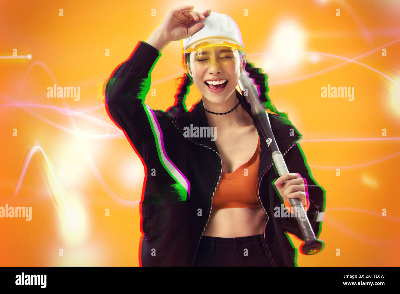 Young girls play baseball Stock Photo - Alamy
