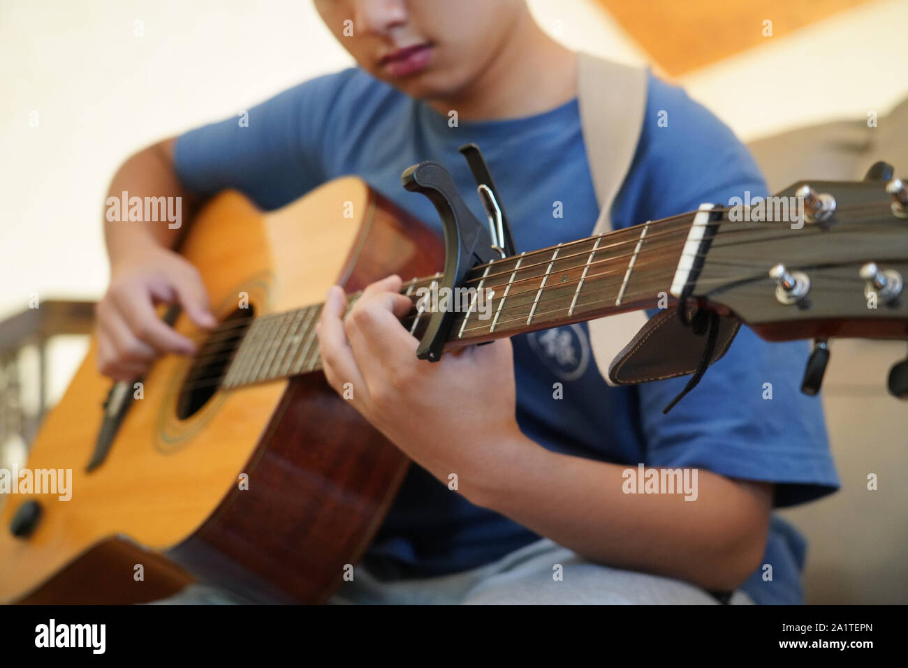 Playing the guitar Stock Photo - Alamy