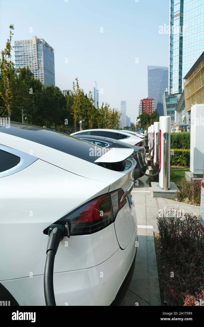 Electric vehicle charging Stock Photo - Alamy