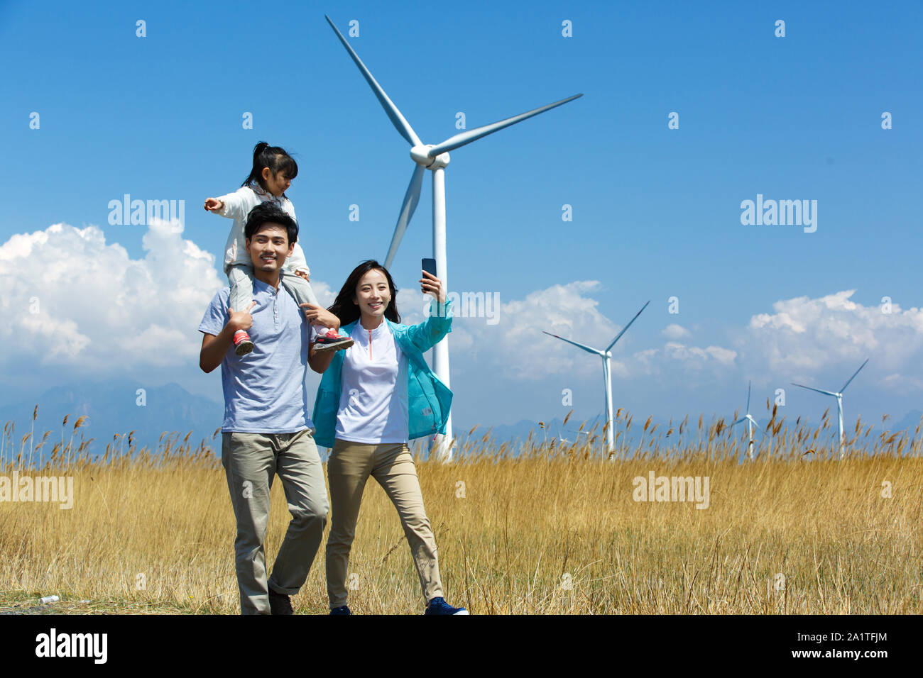 A happy family in the outdoor outing Stock Photo - Alamy