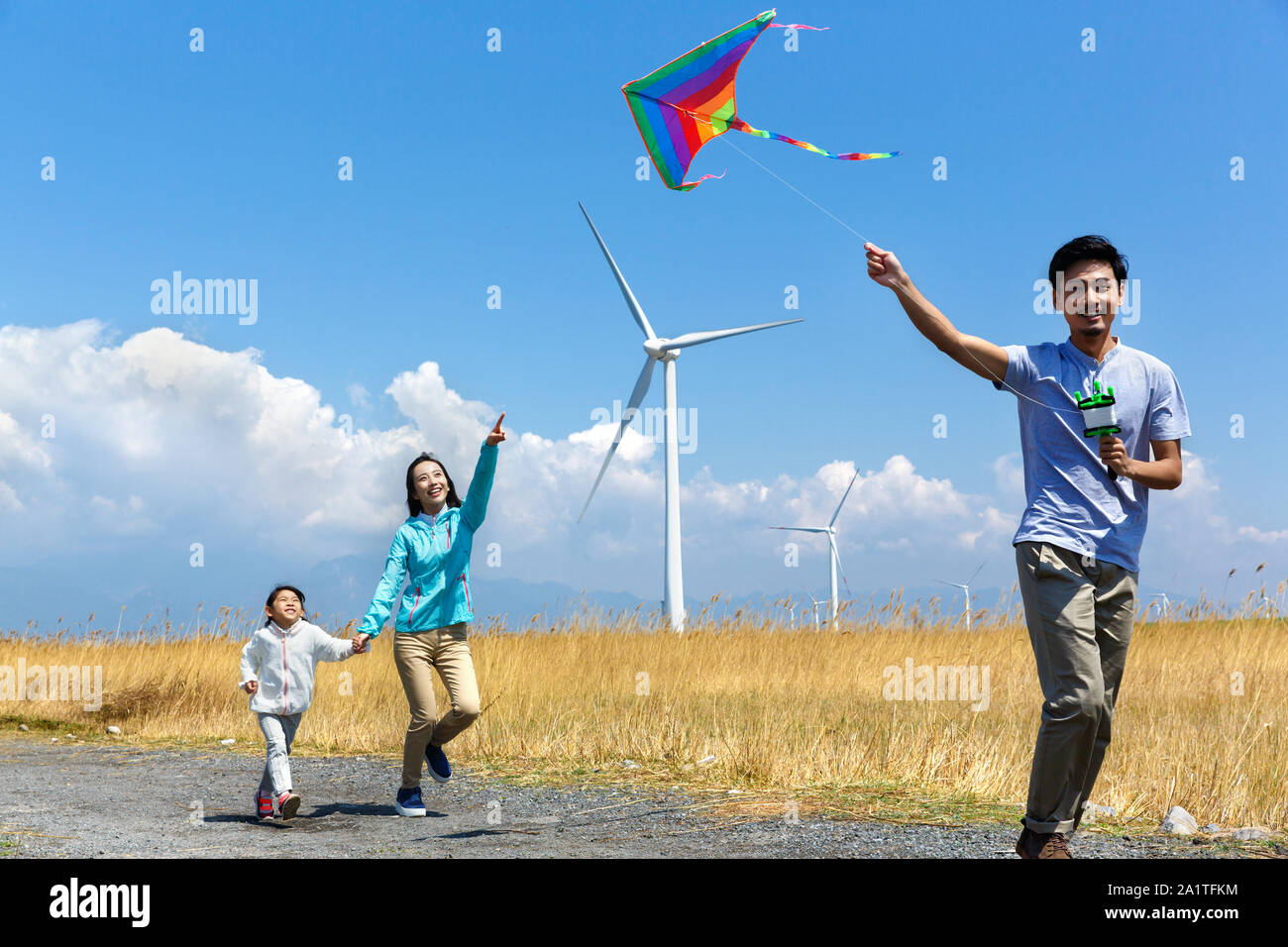 A happy family in the outdoor outing Stock Photo - Alamy