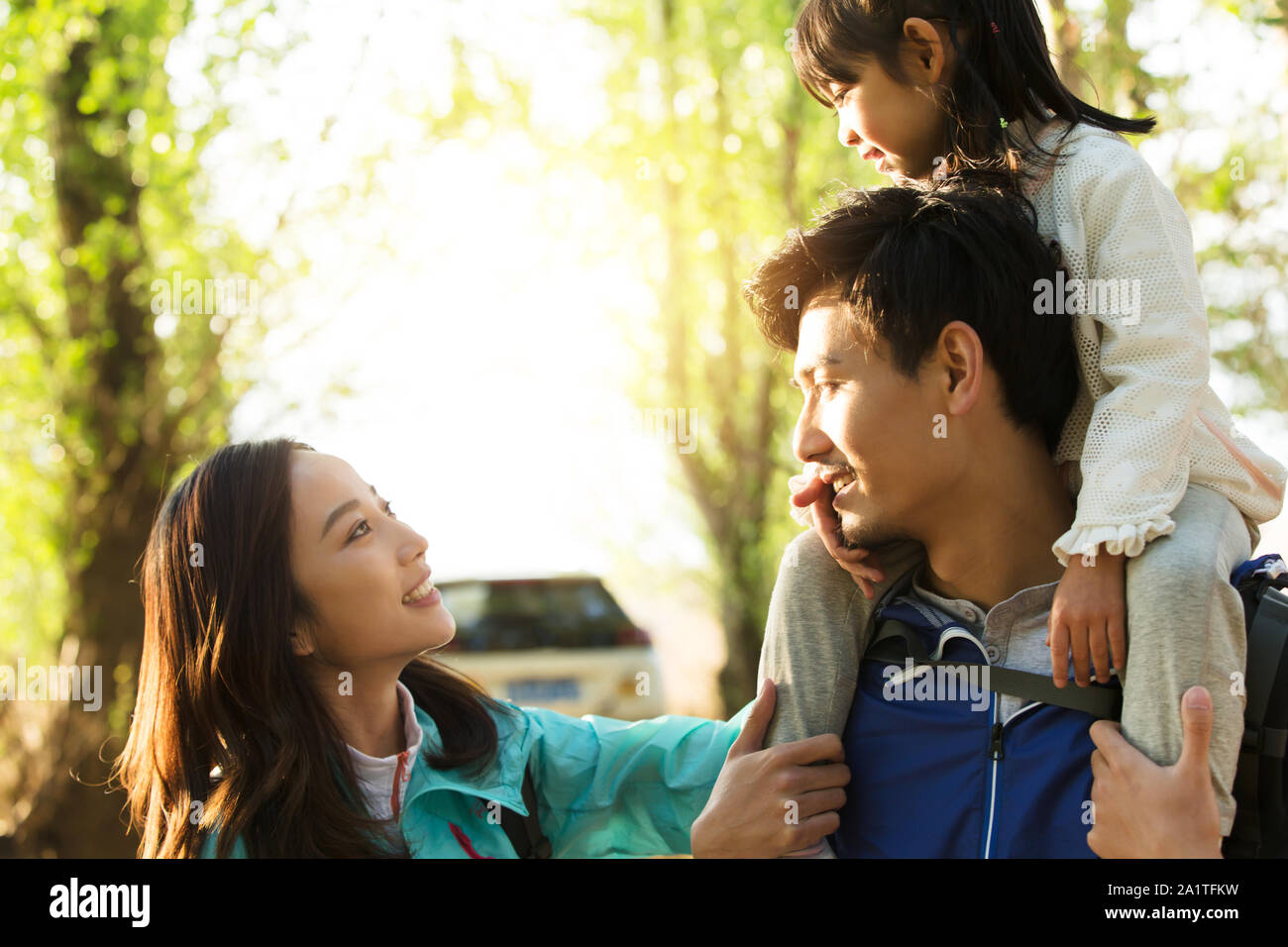 A happy family in the outdoor outing Stock Photo - Alamy