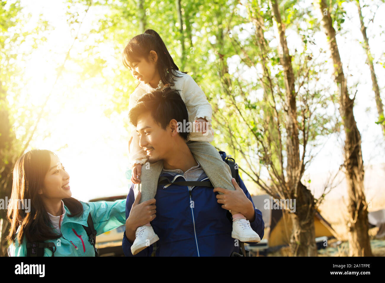 A happy family in the outdoor outing Stock Photo - Alamy