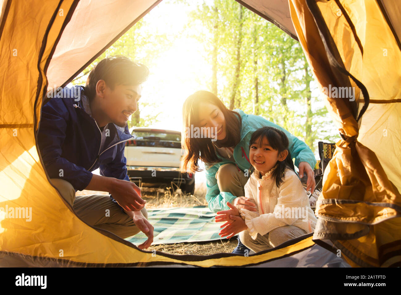 A happy family in the outdoor outing Stock Photo - Alamy