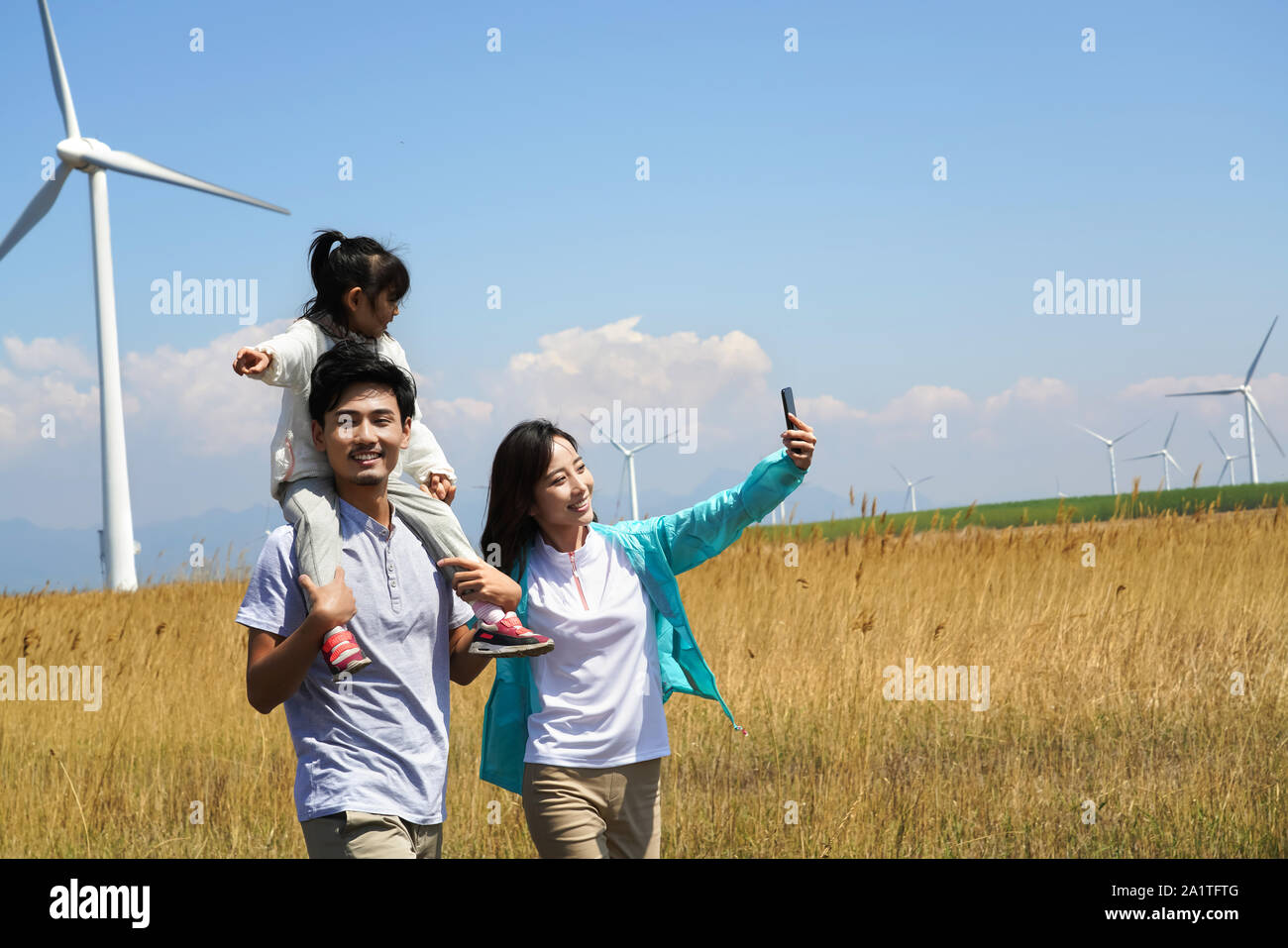 A happy family in the outdoor outing Stock Photo - Alamy