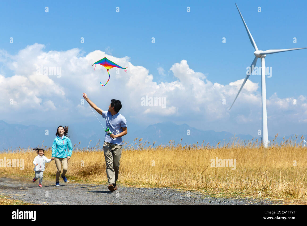 A happy family in the outdoor outing Stock Photo - Alamy