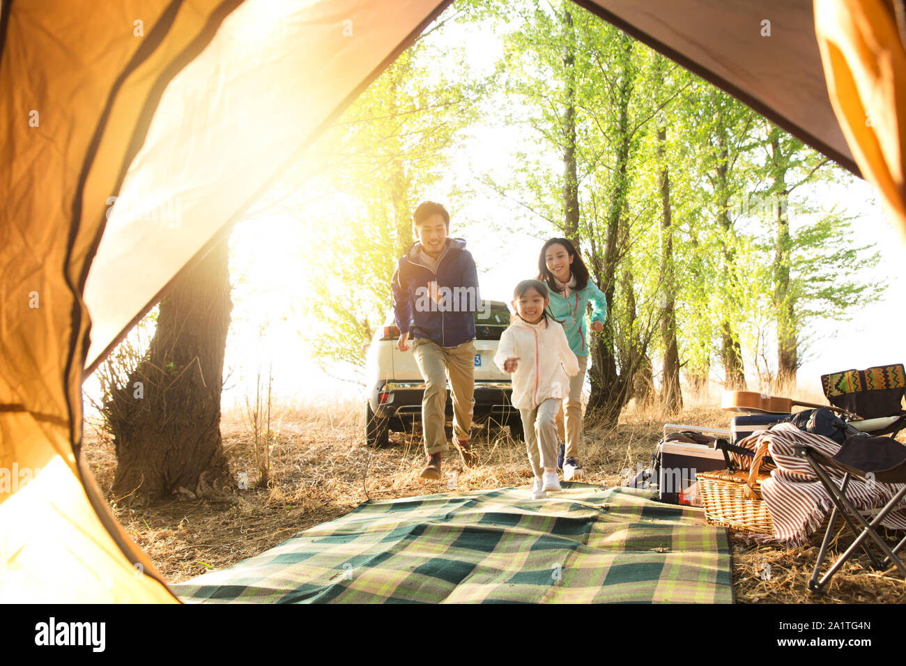 A happy family in the outdoor outing Stock Photo - Alamy