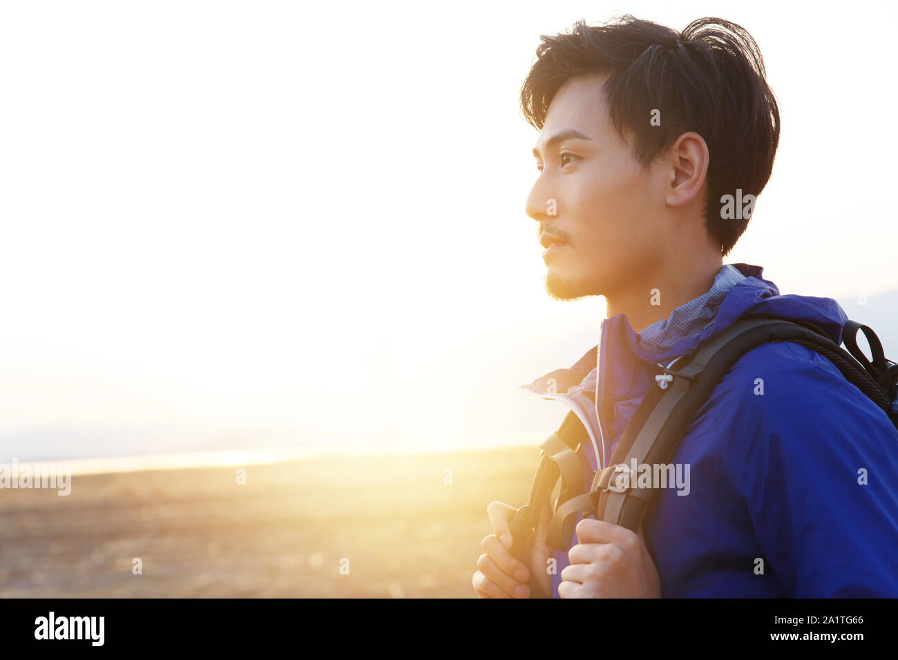 Backpacking trip of young men Stock Photo - Alamy