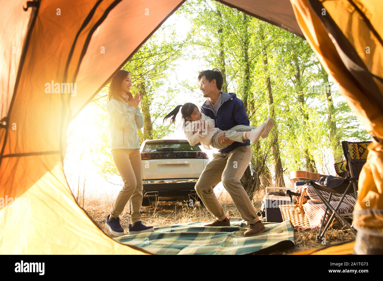 A happy family in the outdoor outing Stock Photo - Alamy