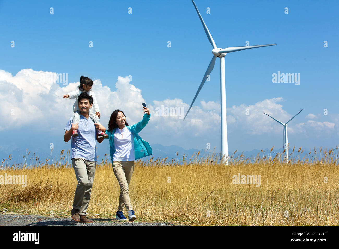 A happy family in the outdoor outing Stock Photo - Alamy