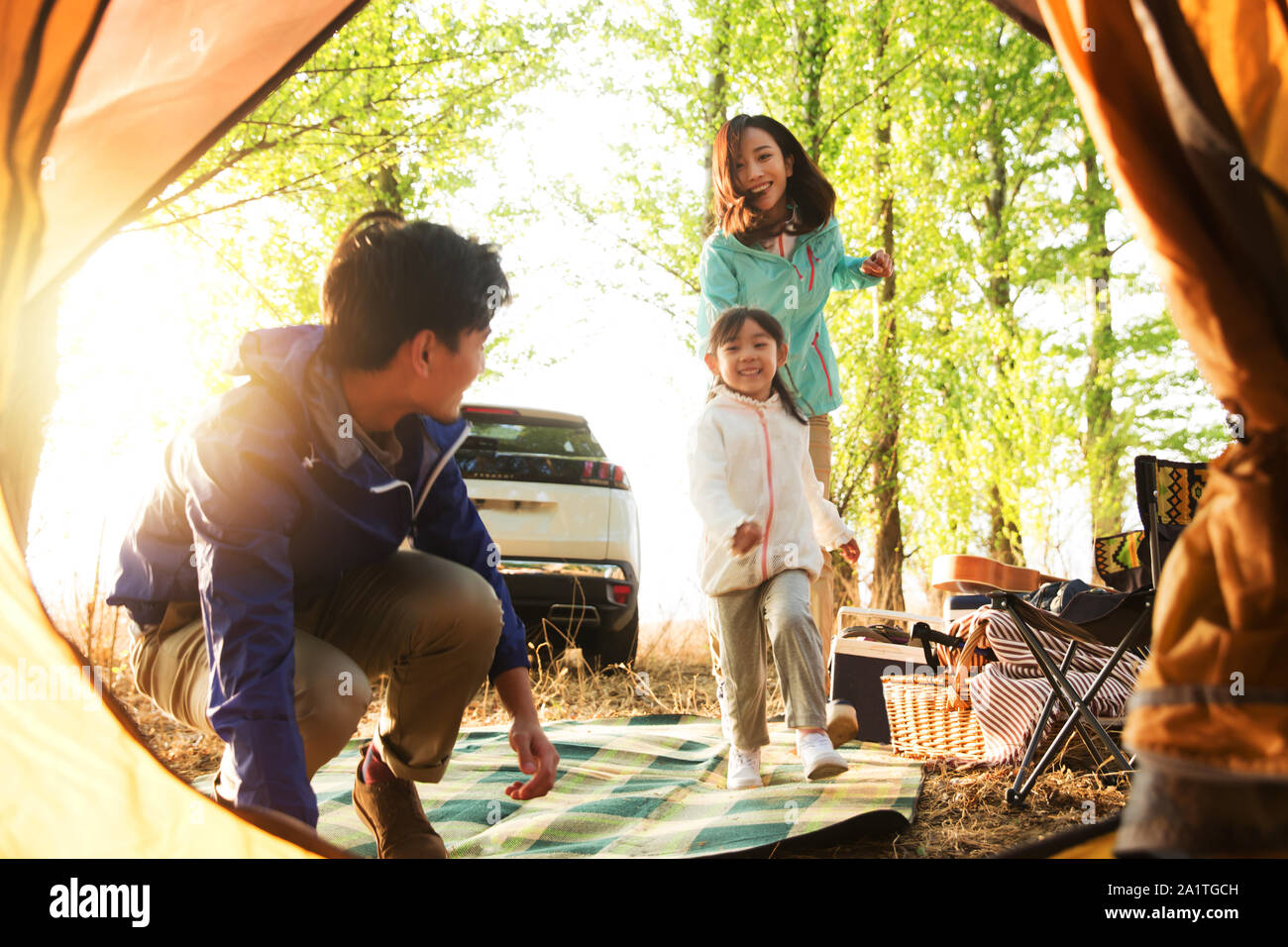 A happy family in the outdoor outing Stock Photo - Alamy