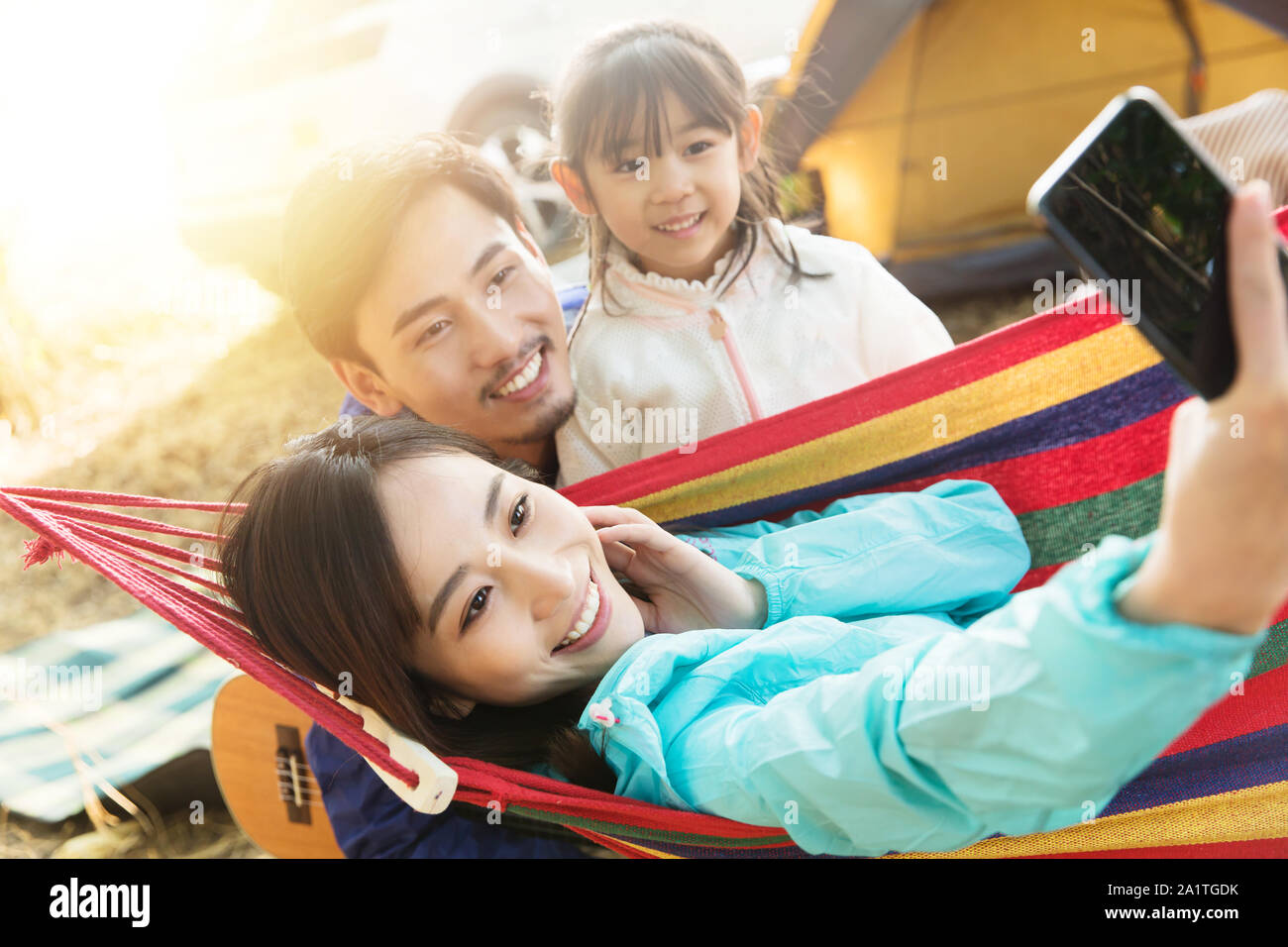A happy family in the outdoor outing Stock Photo - Alamy
