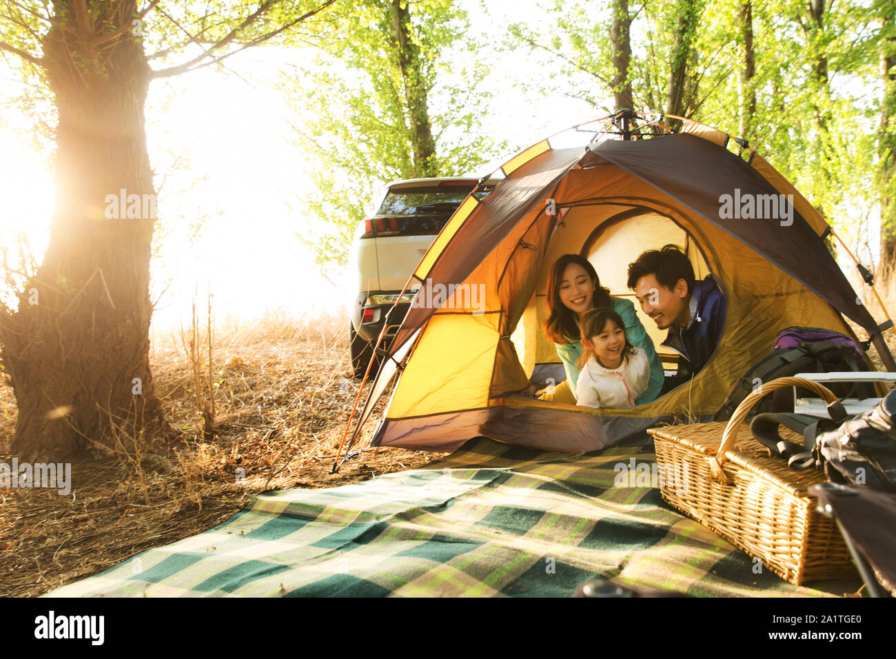 A happy family in the outdoor outing Stock Photo - Alamy