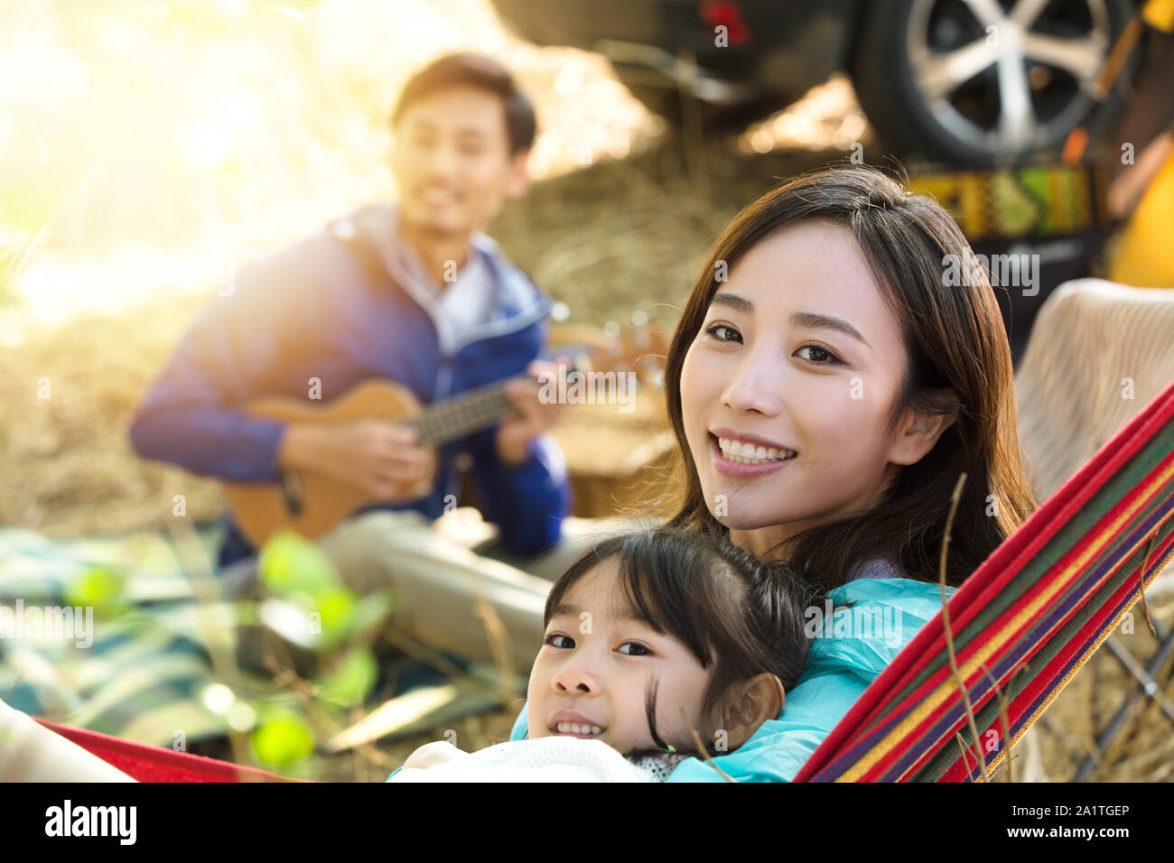 A happy family in the outdoor outing Stock Photo - Alamy