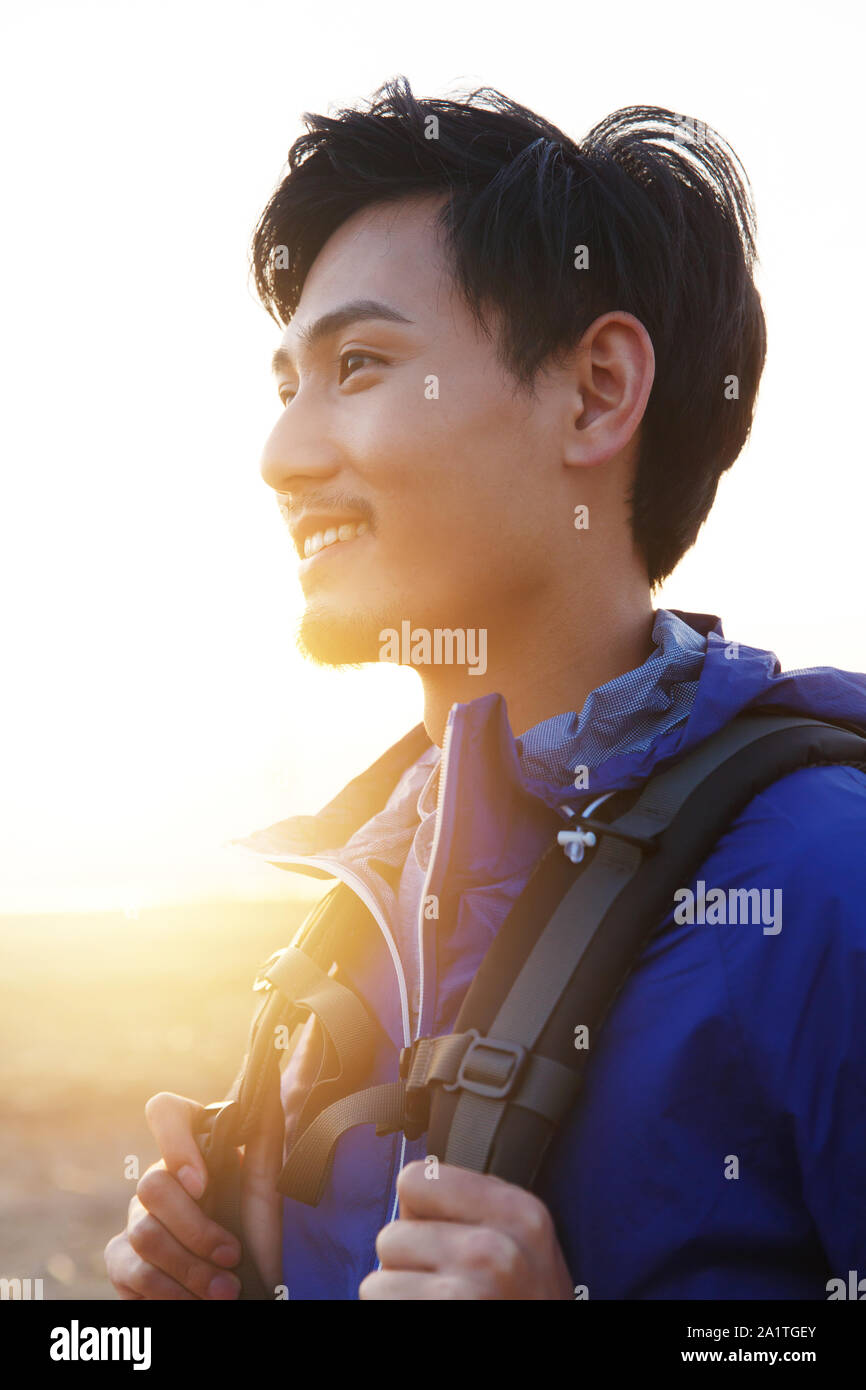 Backpacking trip of young men Stock Photo - Alamy