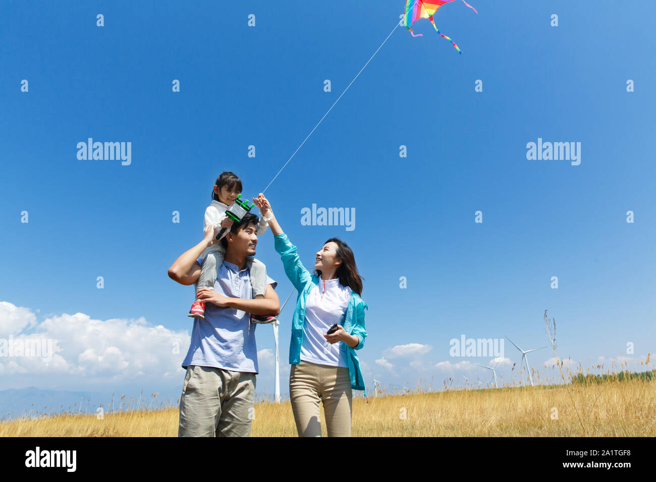 A happy family in the outdoor outing Stock Photo - Alamy