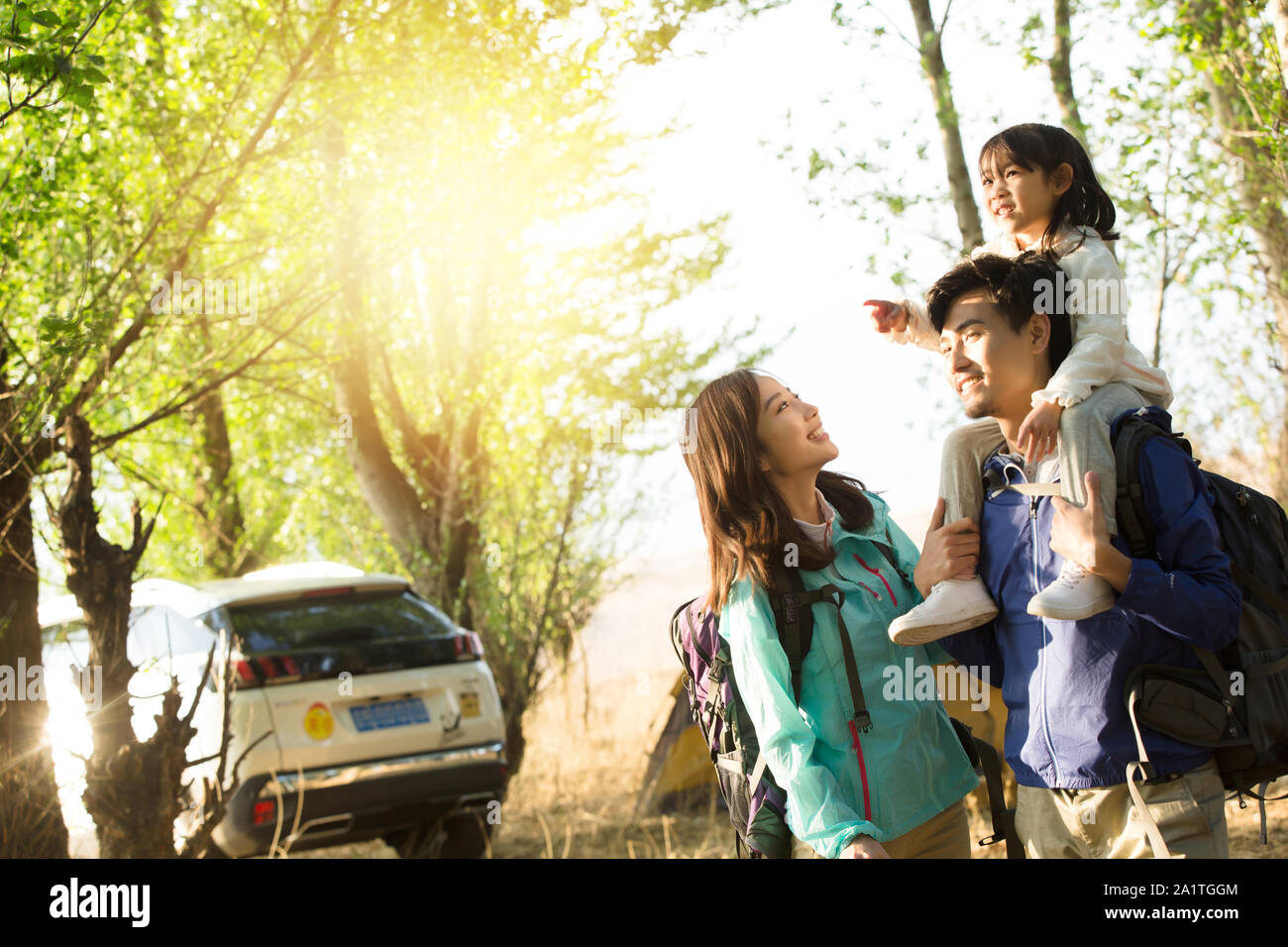 A happy family in the outdoor outing Stock Photo - Alamy