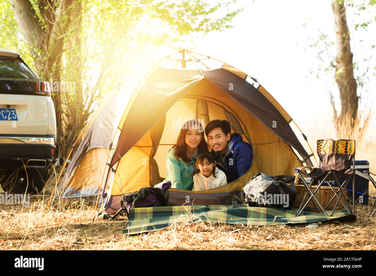 A happy family in the outdoor outing Stock Photo - Alamy