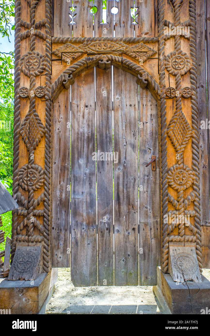 Traditional wood sculpture, decorated gate in Maramures, Romania Stock ...