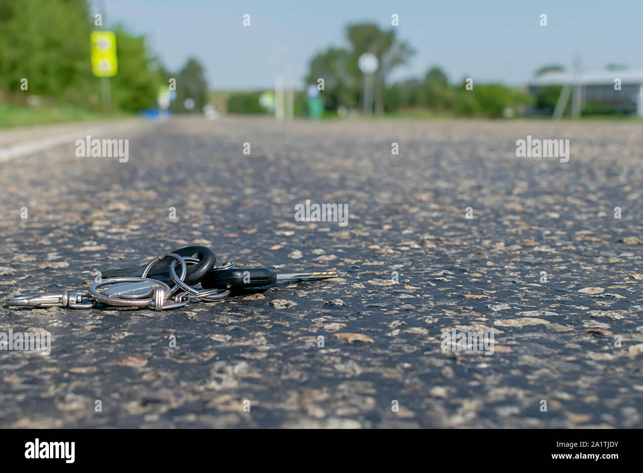 Lost a bunch of keys lying on the asphalt surface of the roadway Stock ...