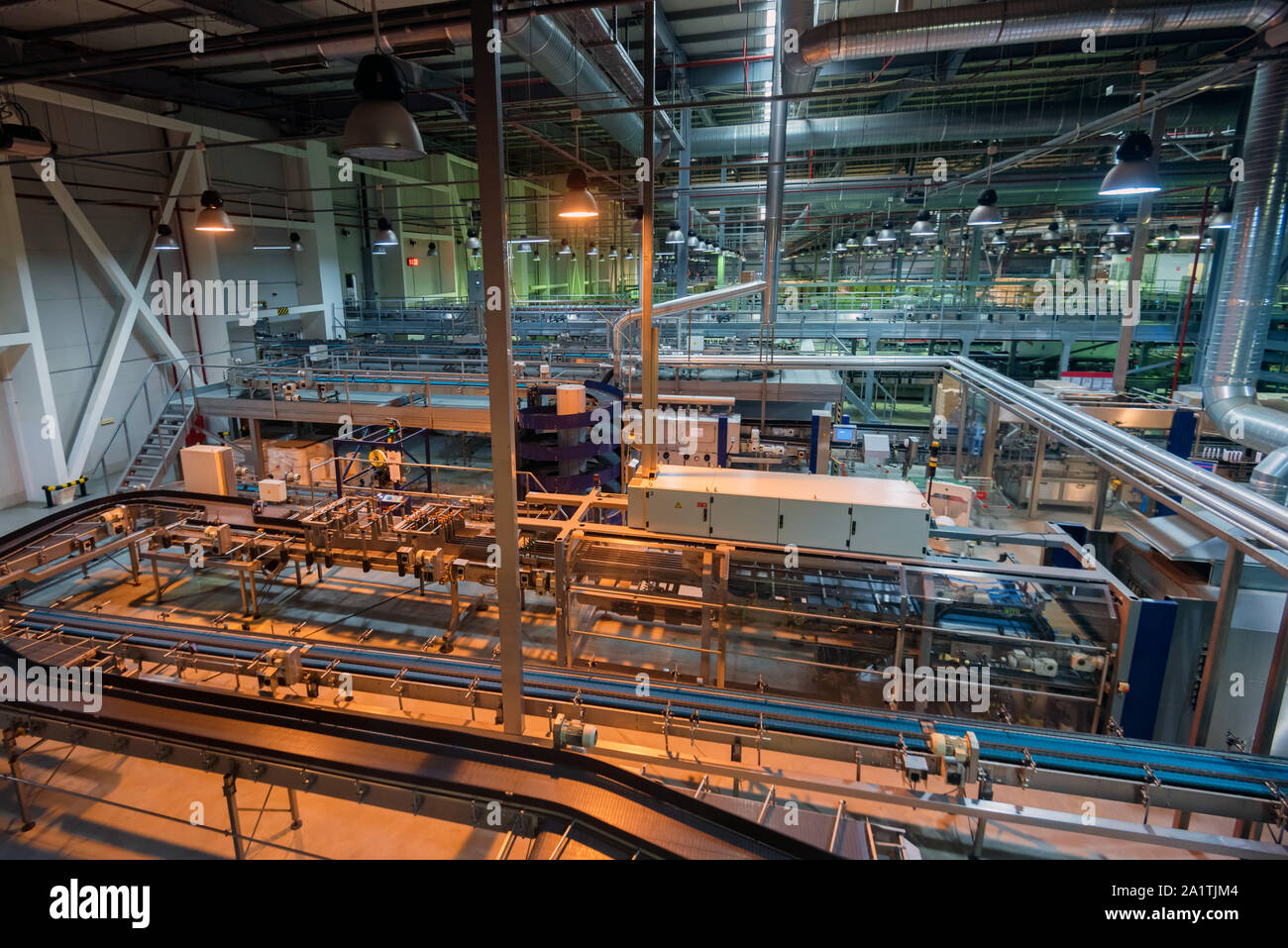 View of tubes and appliances at soft drinks factory Stock Photo - Alamy