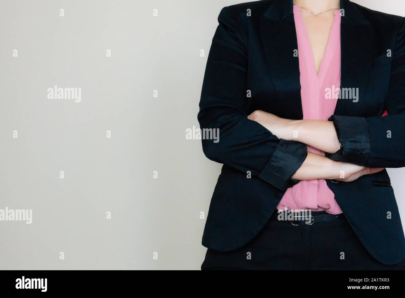 Female professional crossing arms hi-res stock photography and images ...
