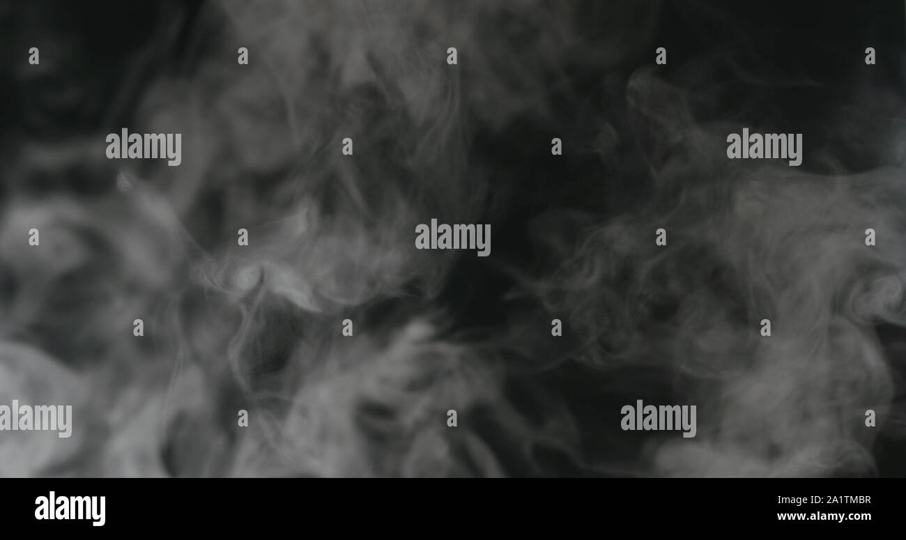 water mist over black background, wide photo Stock Photo - Alamy