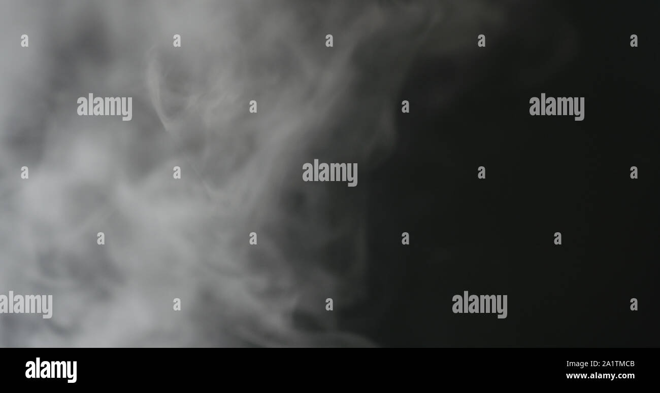 water mist over black background, wide photo Stock Photo - Alamy