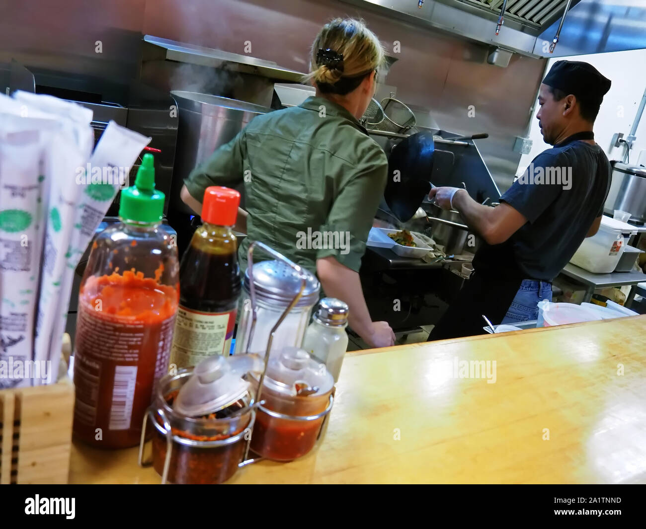 Middletown, CT USA. Nov 2017. Asian chef preparing take out food for ...