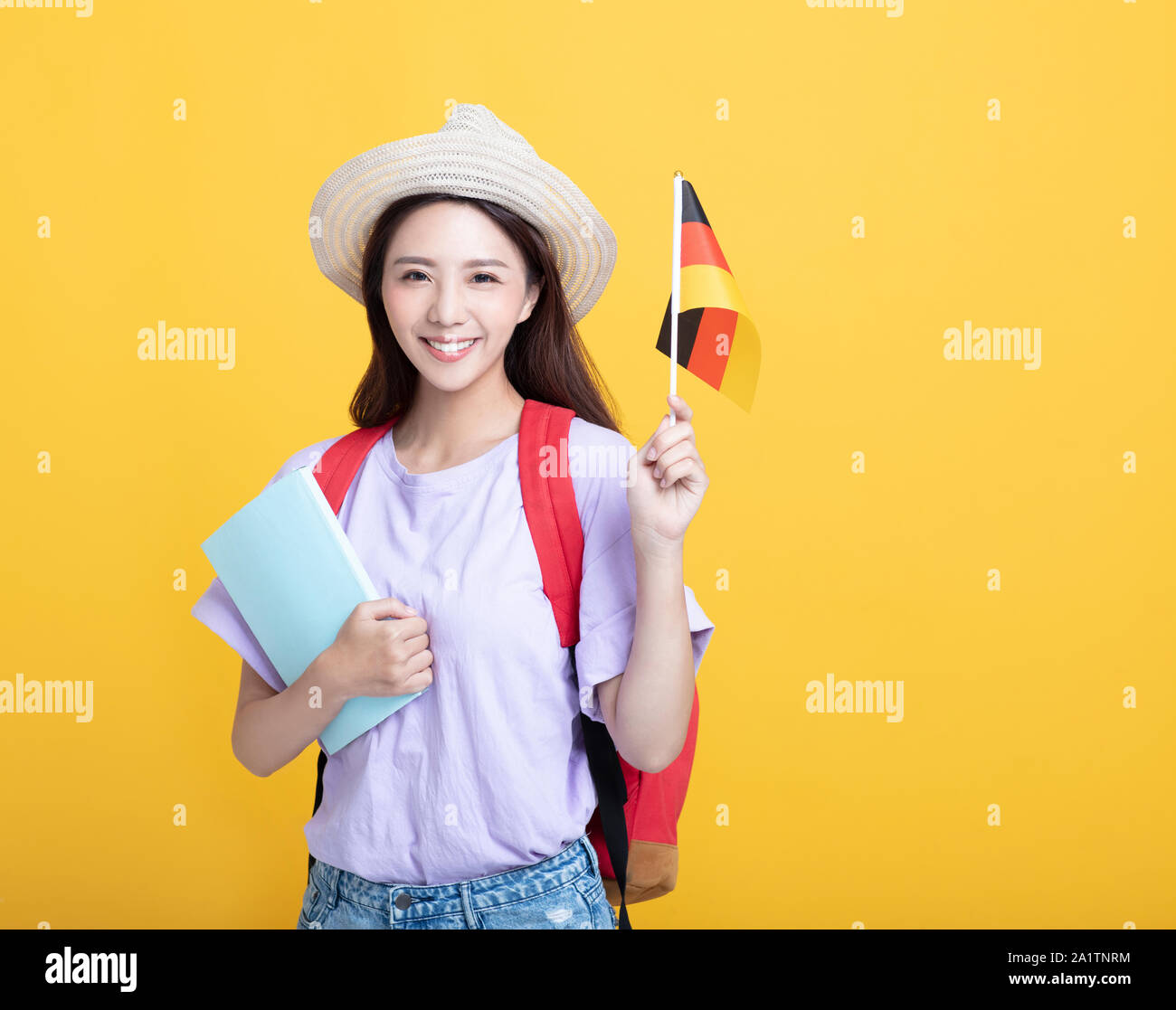 Young asian girl student showing the Germany flag Stock Photo - Alamy
