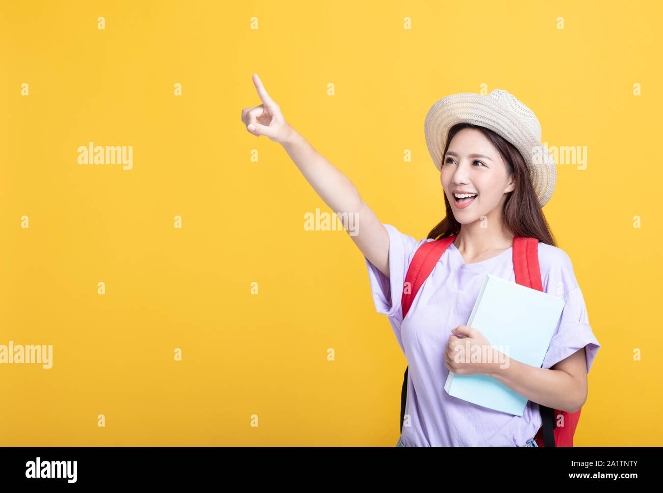 Girl showing book hi-res stock photography and images - Alamy