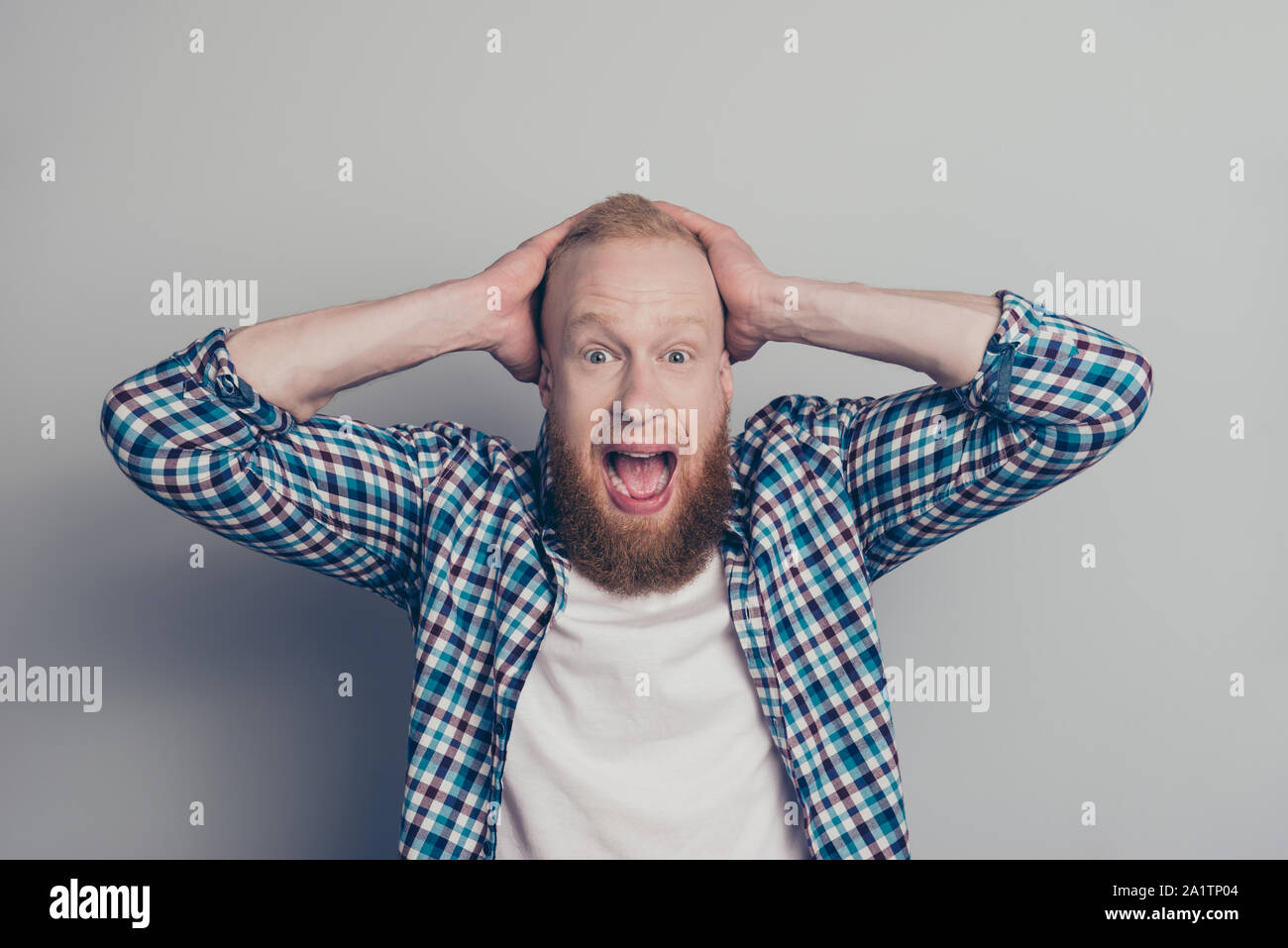 Attractive handsome good-looking person man in casual checkered shirt ...