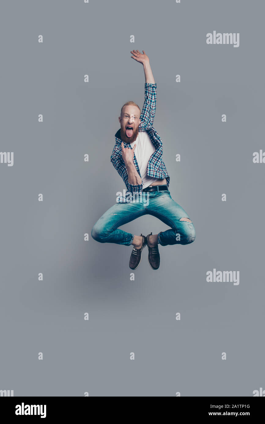 Full legs body size vertical portrait of mad moody man jump isolated on ...