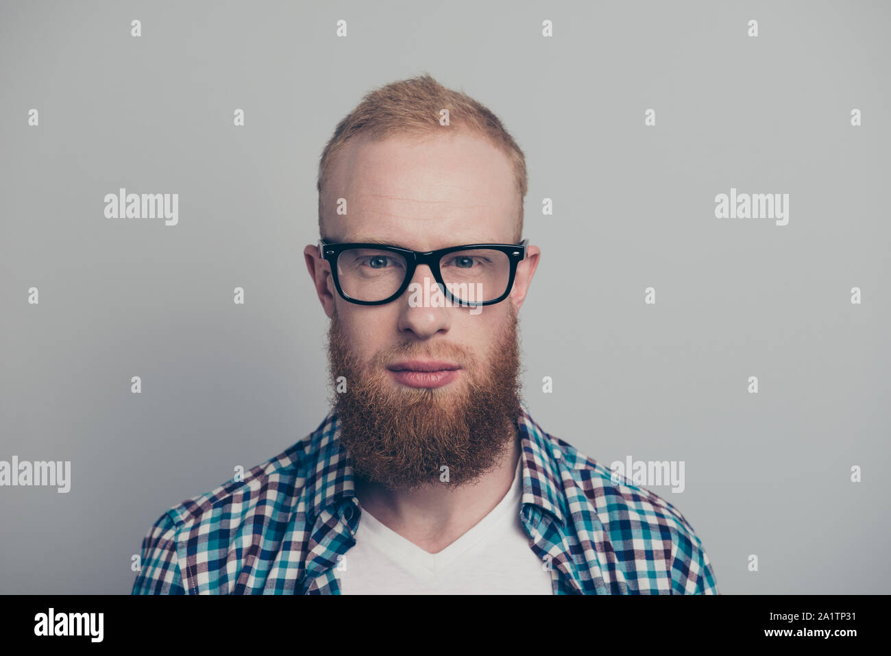 Close up portrait of good-looking nice man stand isolated on light gray ...