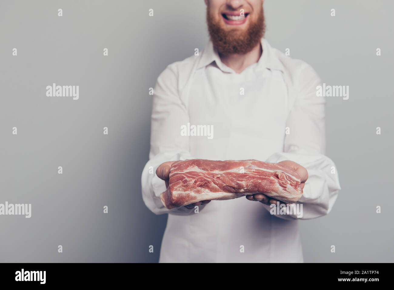 Butcher showing fresh red meat hi-res stock photography and images - Alamy