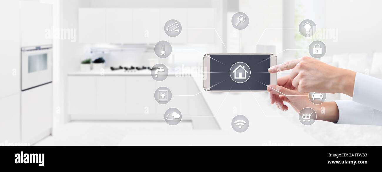 smart home automation control concept hand touch cell phone screen with ...