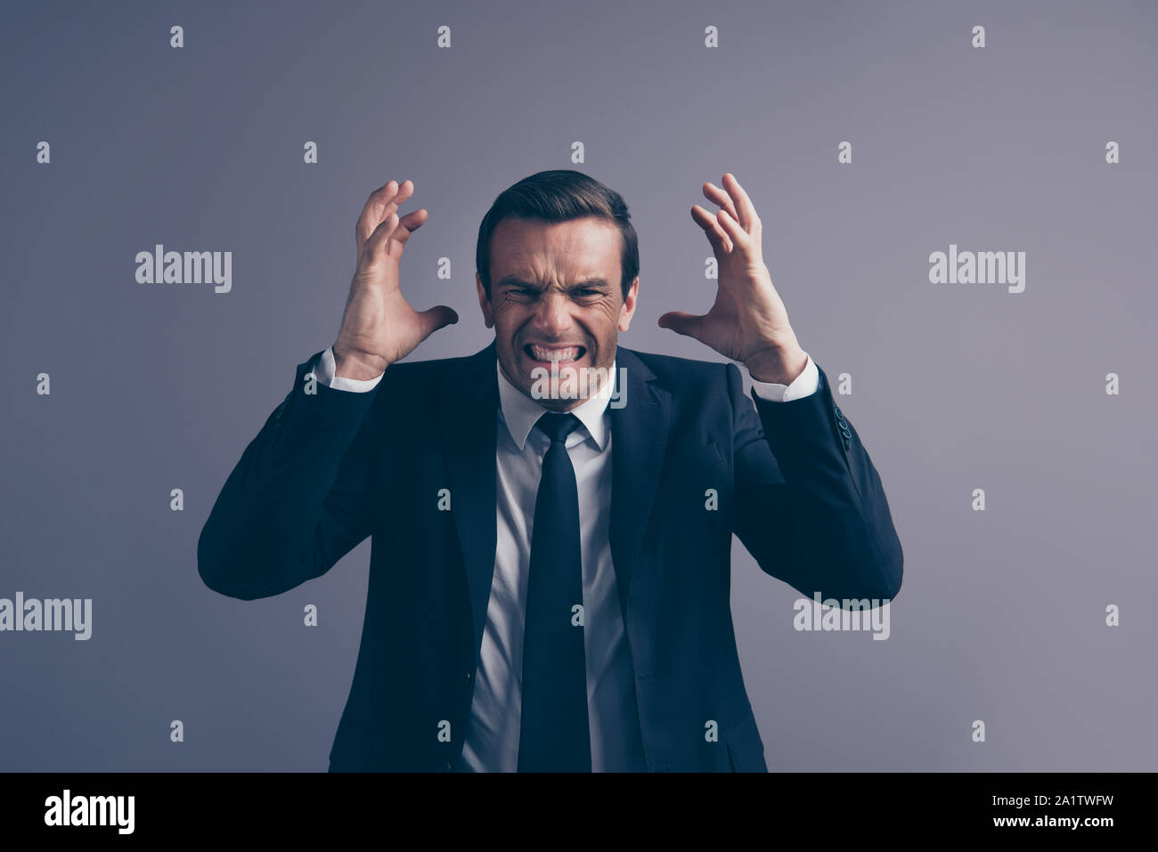 Angry man showing teeth hi-res stock photography and images - Alamy