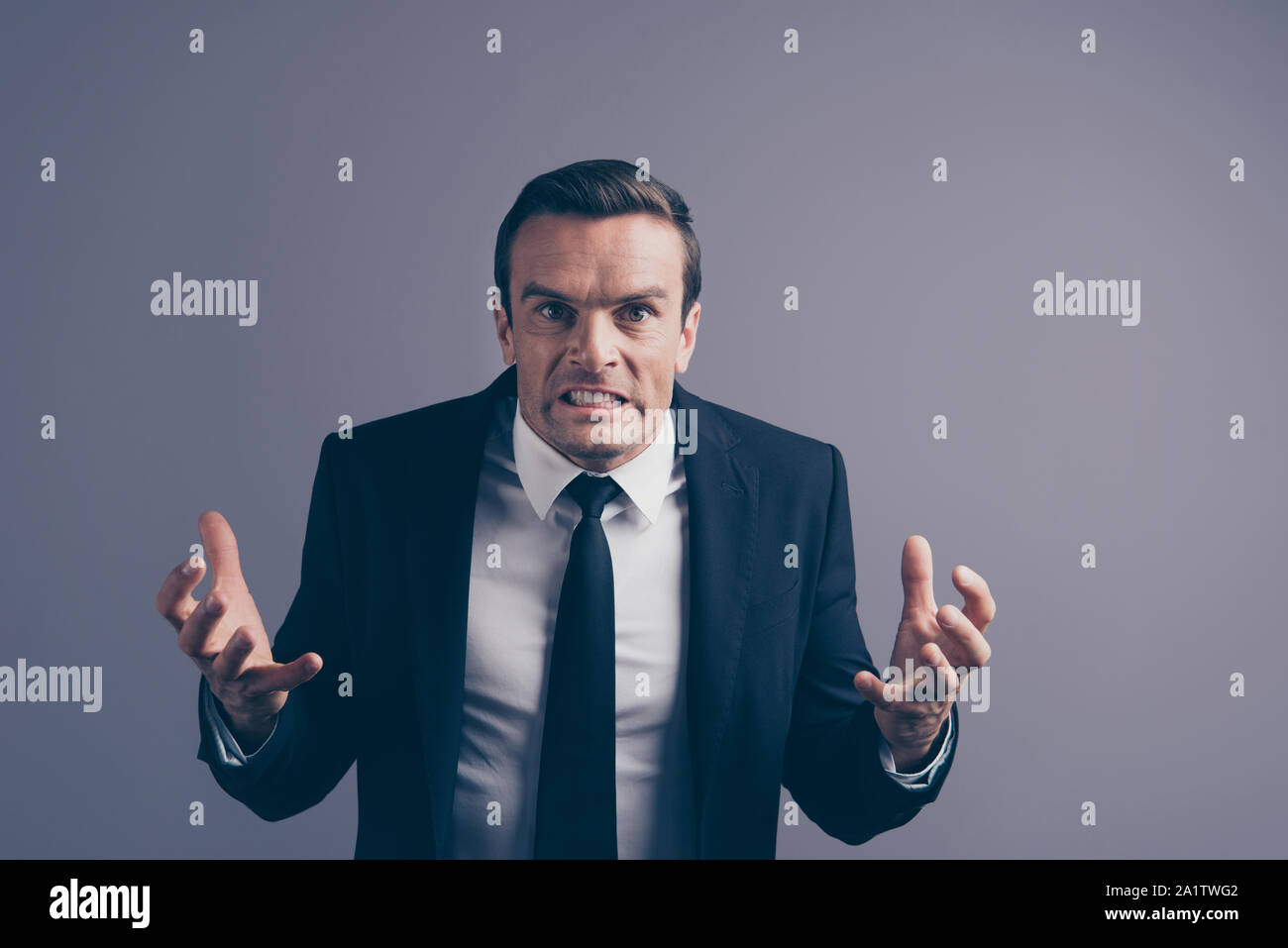 Closeup photo portrait of mad confused scaring frightening showi Stock ...