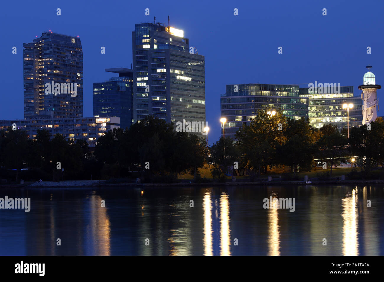 Vienna skyline on the Danube river at night Stock Photo - Alamy
