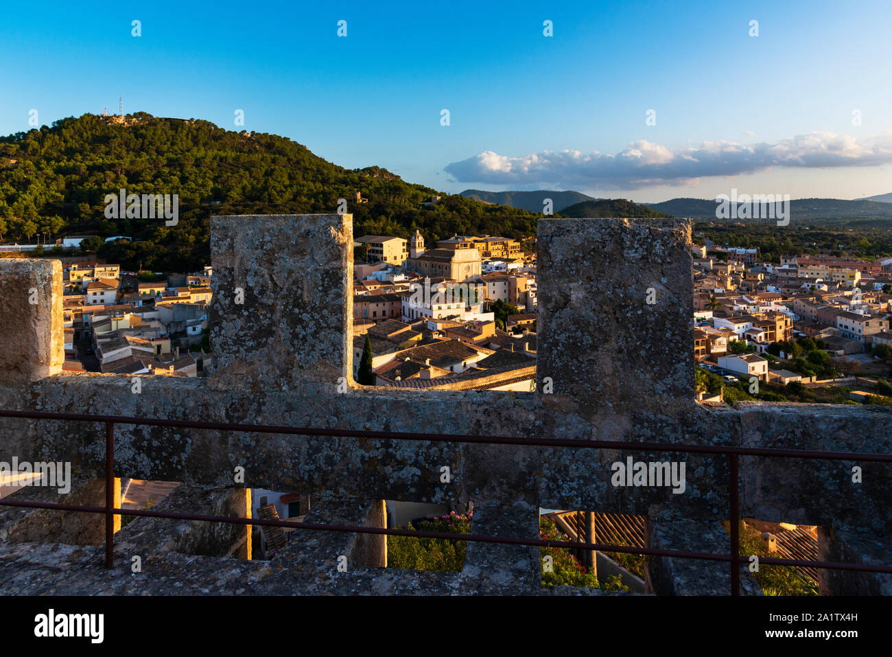 Sunset view from the ramparts of the castle on the town of Capdepera ...
