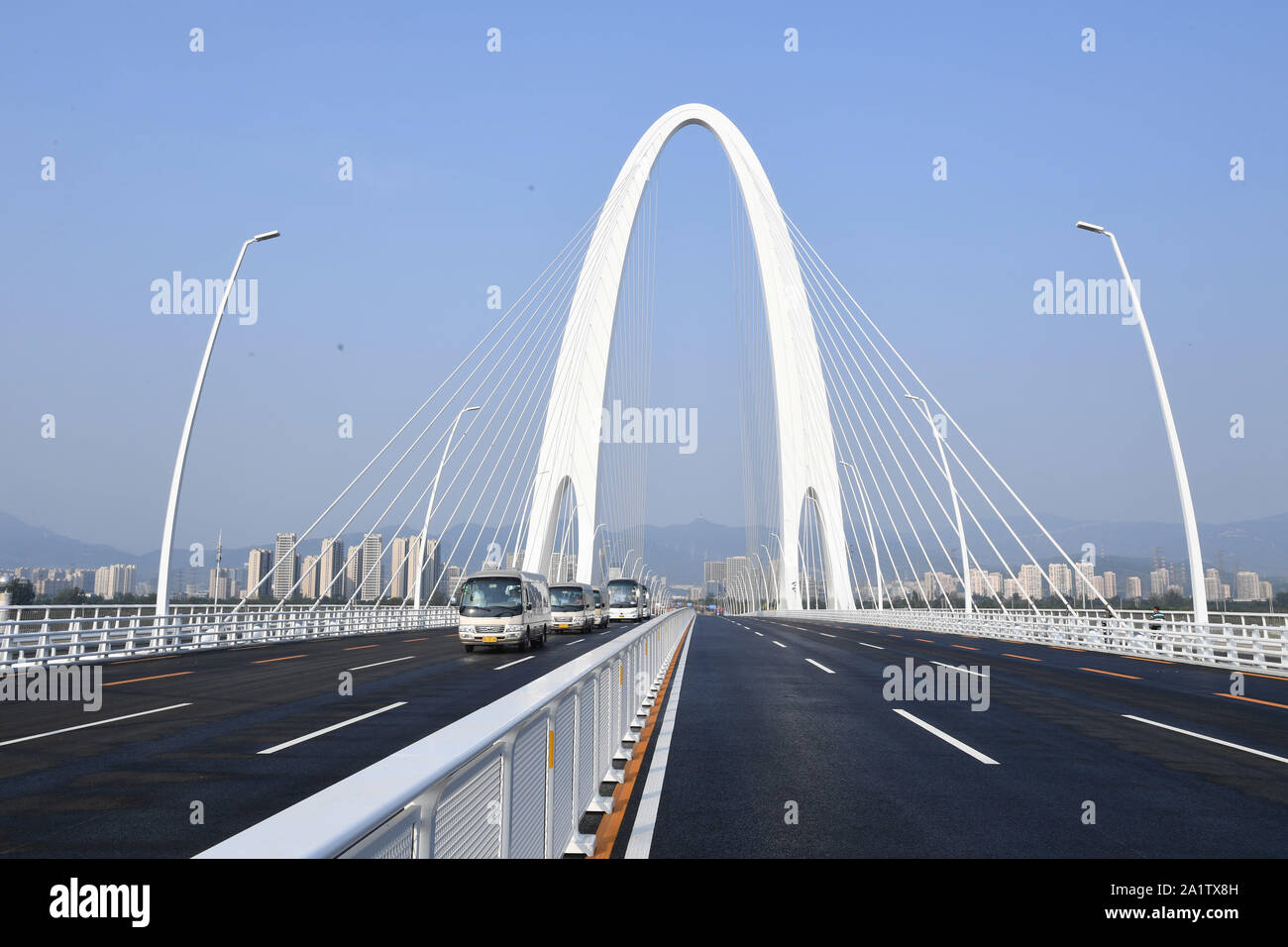Beijing, China. 29th Sep, 2019. Cars run on the New Shougang Bridge in ...