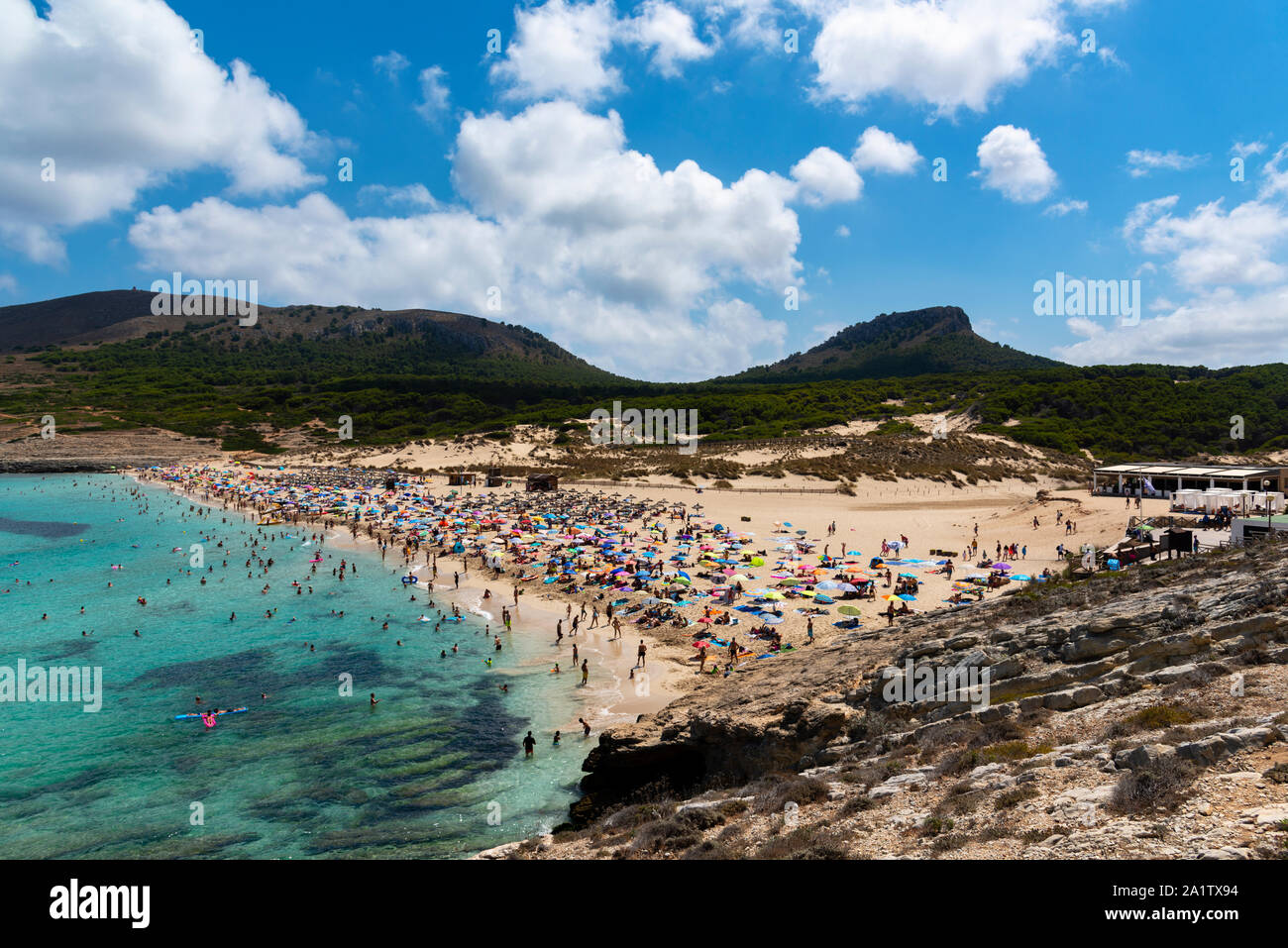 view on the beach of Cala Mesquida Majorca Spain with many tourists and ...
