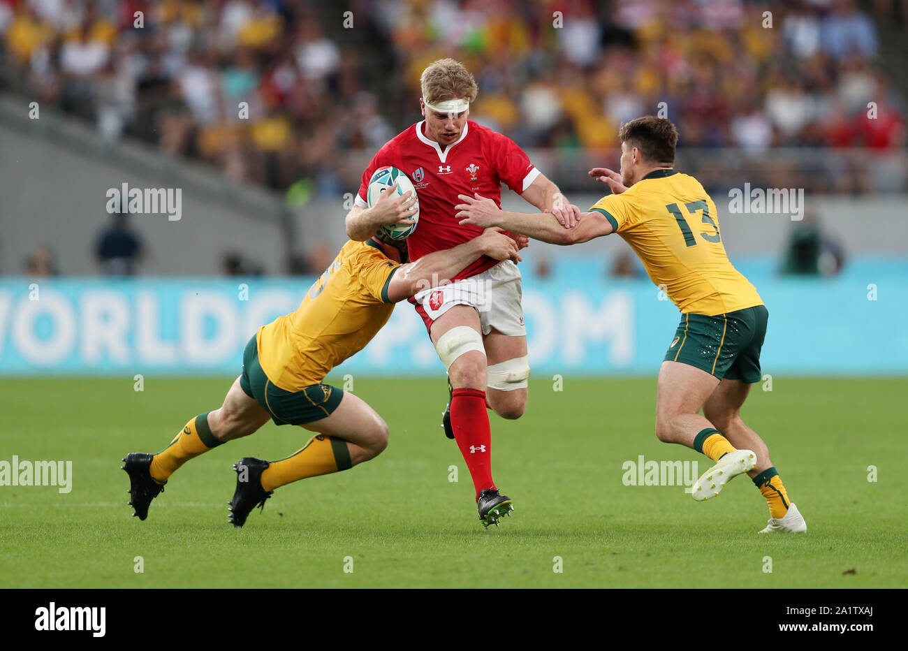 Wales' Aaron Wainwright is tackled by Australia's David Pocock and ...