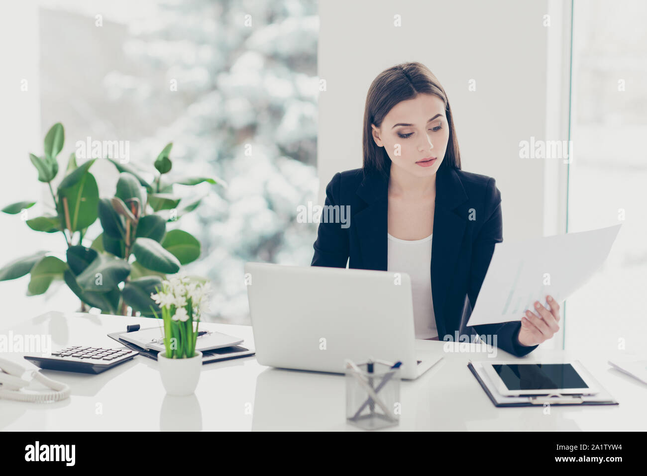 Beautiful classy elegant lady wearing black jacket working with Stock ...