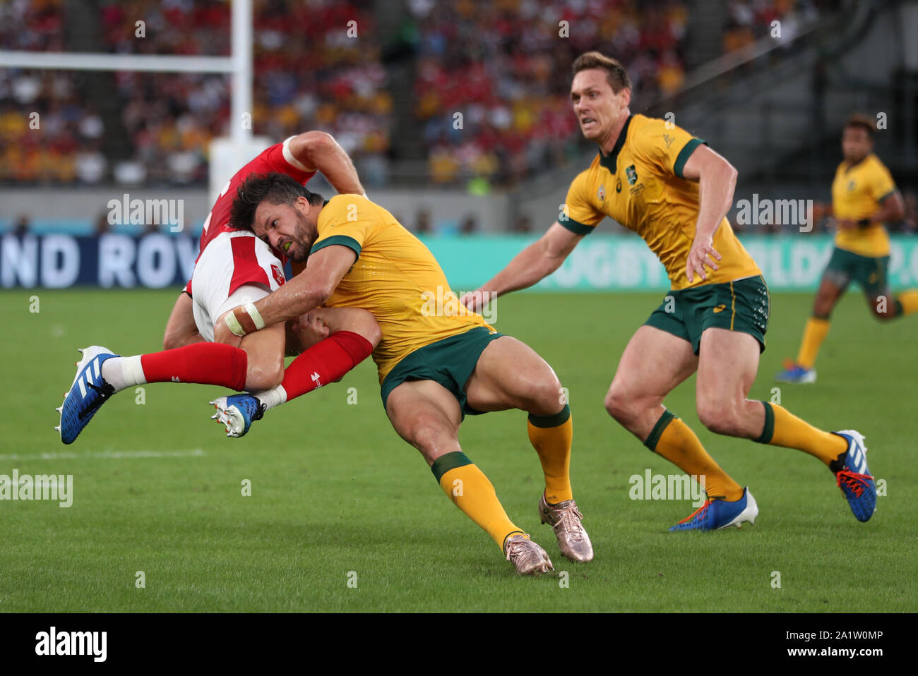 Australia's Adam Ashley-Cooper tackles Wales' Liam Williams during the ...