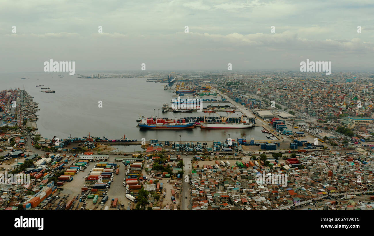 Sea port with container terminal top view in the city of Manila ...