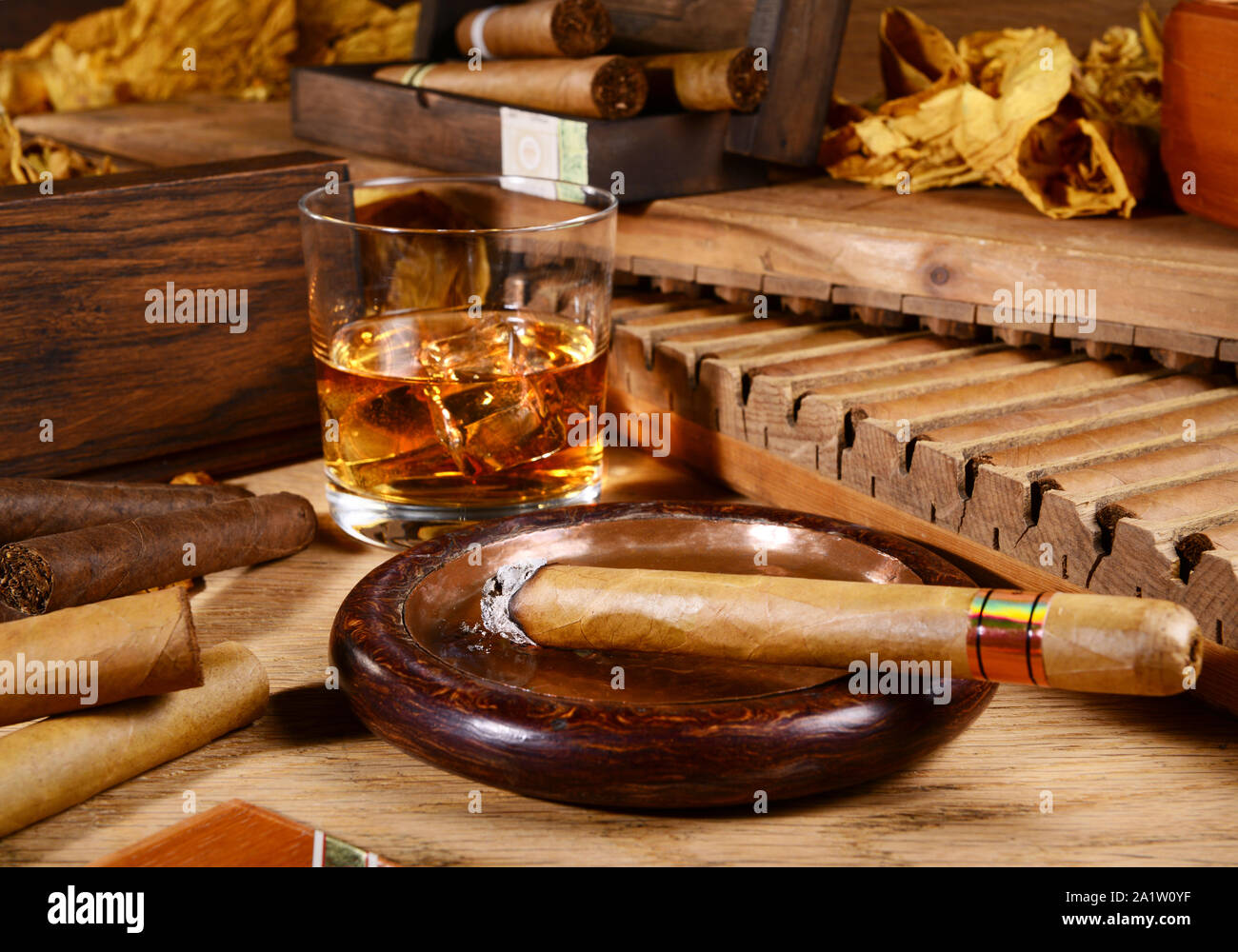 Cigars and Whiskey on wooden Background Stock Photo - Alamy