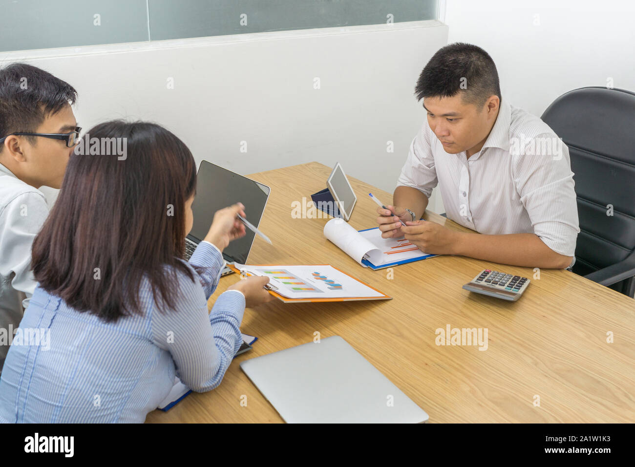 Business team discuss to each other in meeting room Stock Photo - Alamy