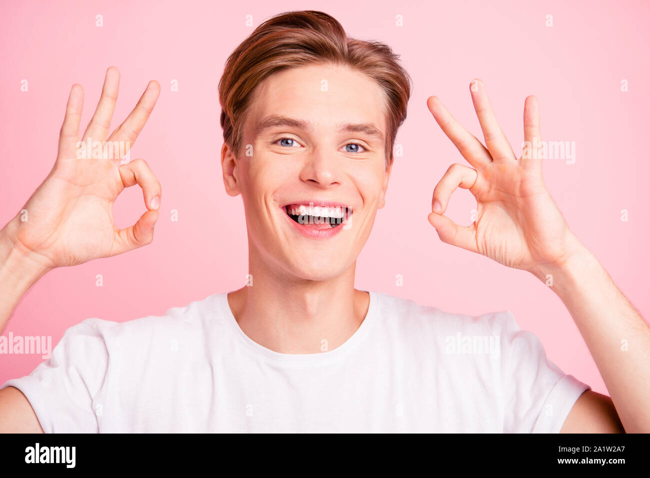 Close up portrait of good-looking man stand isolated on vivid pi Stock ...