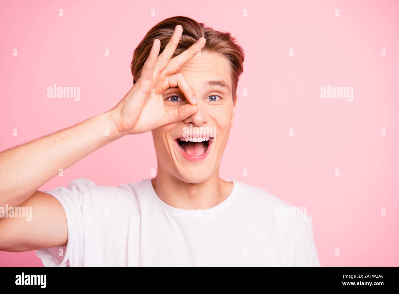 Careless carefree style stylish brunet hair man look at camera w Stock ...